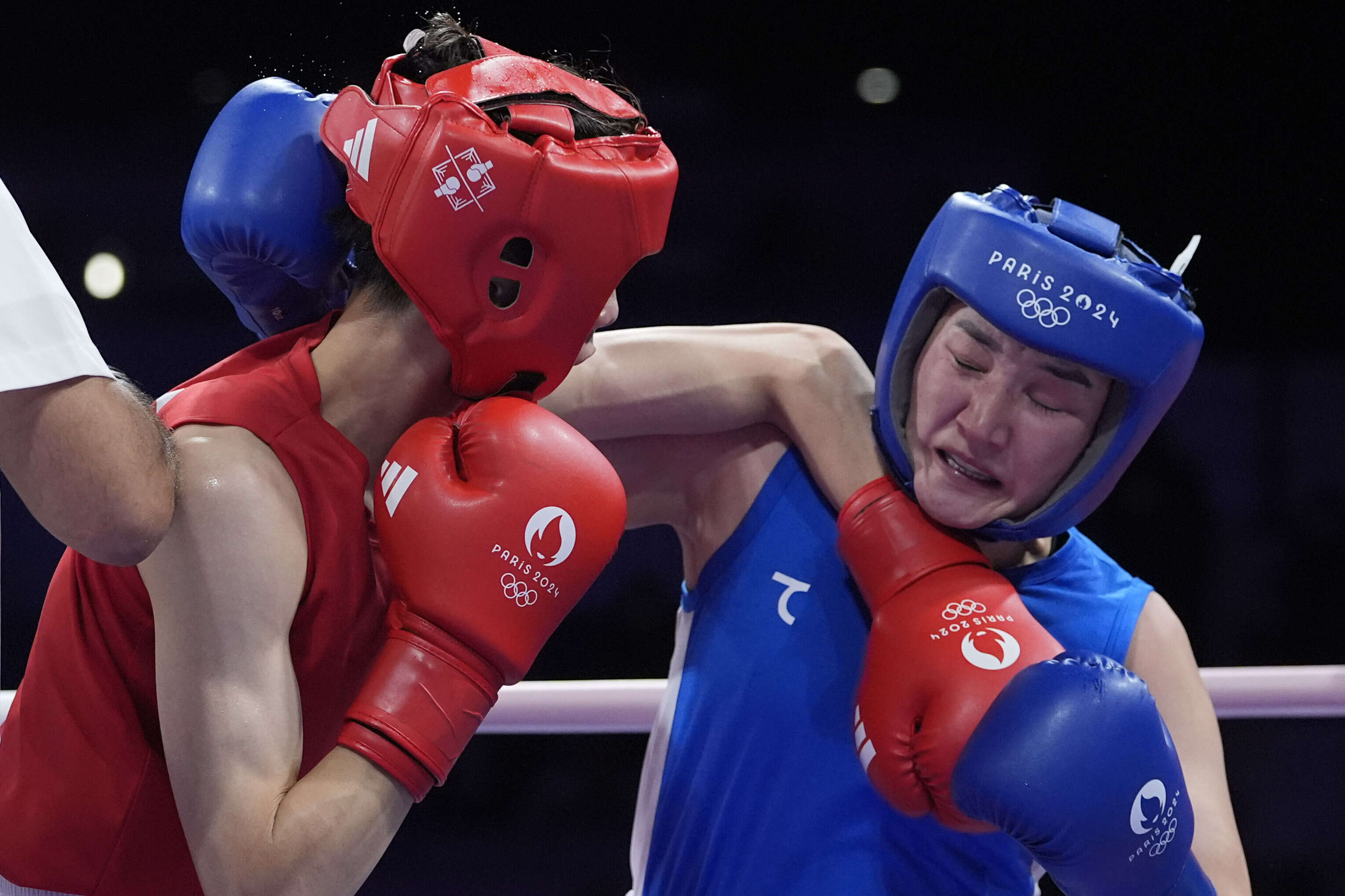 Boxer Lin Yu-ting of Taiwan wins her opening bout at the Paris Olympics ...