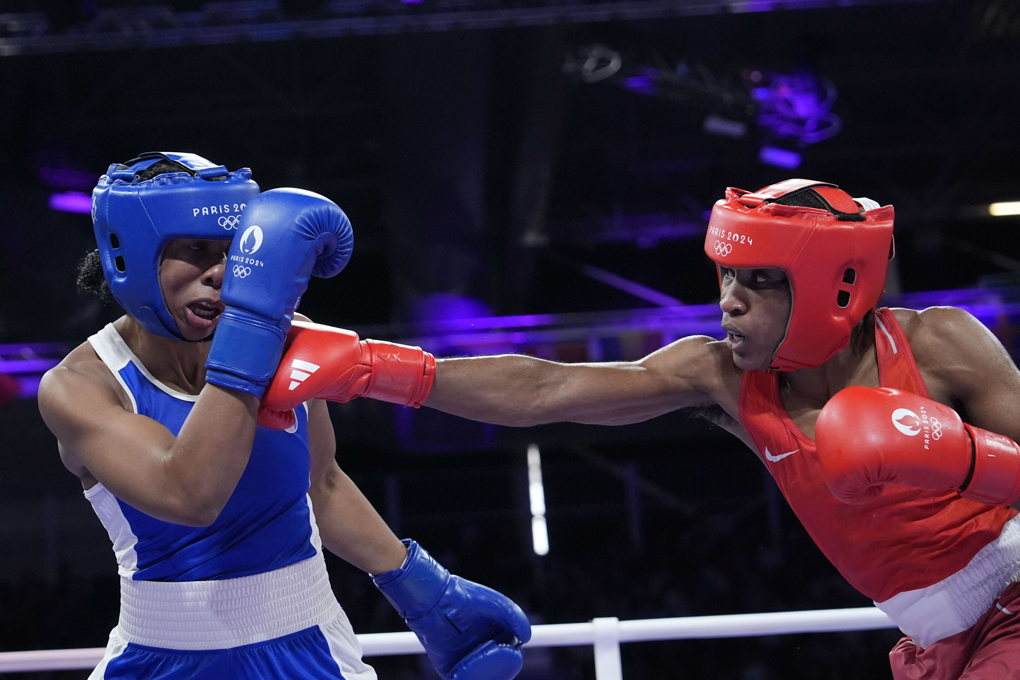 Boxer Cindy Ngamba becomes first athlete competing as a refugee to ...